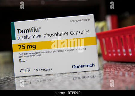 A package of Tamiflu (Oseltamivir) prescription pharmaceuticals ...