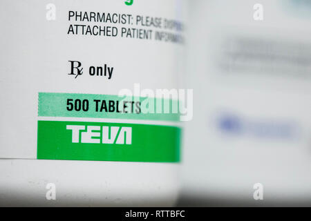 A Teva Pharmaceutical Industries logo is seen on prescription ...