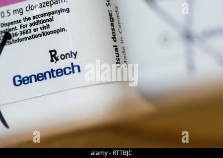 A Genentech logo is seen on prescription pharmaceutical packaging ...