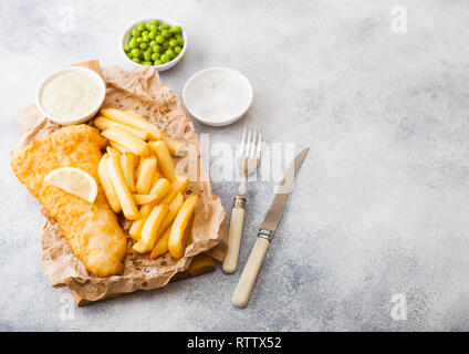 Plate, knife and fork on stone background Stock Photo - Alamy