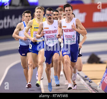 Jakob Ingebrigtsen running with his brothers in the 5000 meters at the 2019 World Championships ...