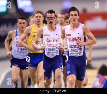 Jakob Ingebrigtsen running with his brothers in the 5000 meters at the 2019 World Championships ...
