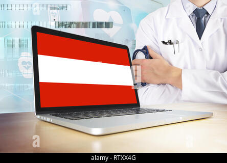 Austrian Doctor standing with stethoscope on Austria flag background ...