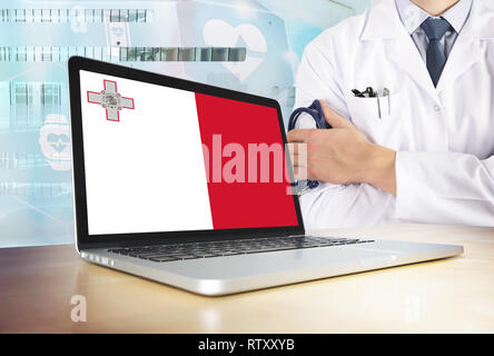Maltese Doctor standing with stethoscope on Malta flag background ...