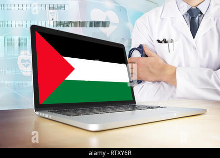 Palestinian Doctor standing with stethoscope on Palestine flag ...