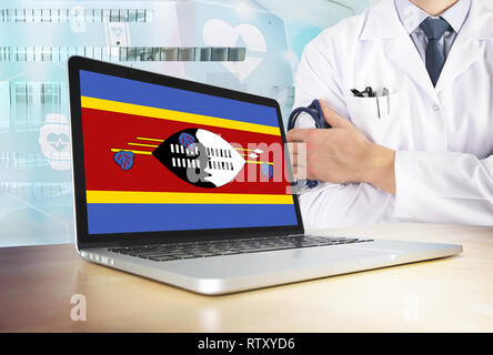 Swazi Doctor standing with stethoscope on Swaziland flag background ...