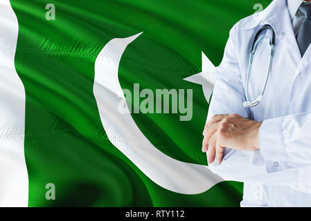 Pakistani medicine and healthcare concept. Doctor close up against flag ...