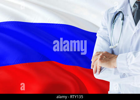 Russian Doctor standing with stethoscope on Soviet Union flag ...