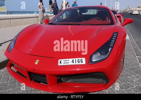 A Ferrari 488 GTB Front view with headlights on and turned wheel Stock ...