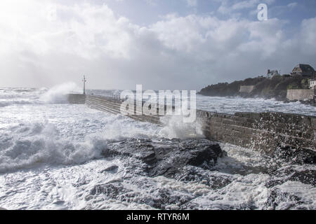 Porthleven clock tower with crashing storm waves,Huge waves generated ...