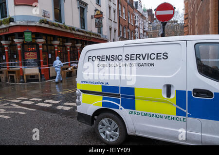 Forensics services crime scene investigation van painted with the organisation logo. UK ...