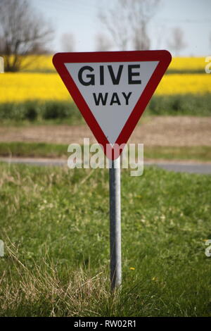 Give Way markings at a minor road junction Stock Photo - Alamy