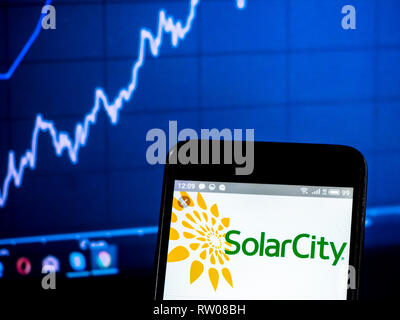 SolarCity energy company logo seen displayed on smart phone Stock Photo ...