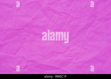 creased pink color tissue paper texture background Stock Photo - Alamy