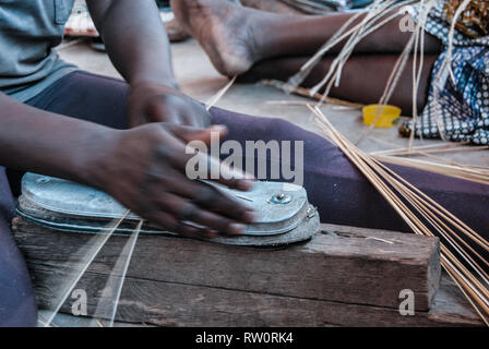 A photo of a local Ghanaian woman weaving the famous decorative and ...