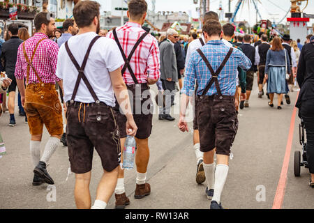 munich oktoberfest amusement park crowd german people Stock Photo - Alamy