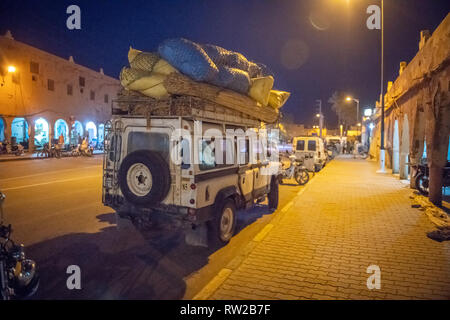 Overloaded Land Rover Defender 110, Foum Zguid, Morocco Stock Photo - Alamy
