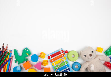 Baby or kids toys background. Top view of colorful toys. Green tractor ...