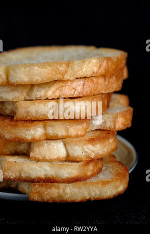 This loaf of bread, in original form, highlights texture, shape, and ...