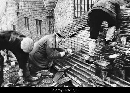 Winston Churchill building a wall at Chartwell. August 1928 Stock Photo ...
