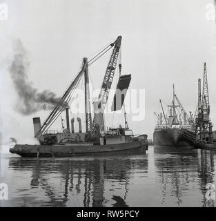 1950s, historical, London Docks, a steamship with funnel moored ...