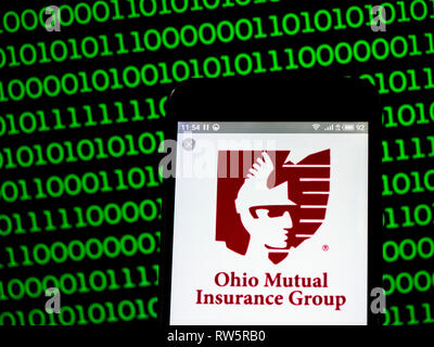 Ohio Mutual Insurance Group logo seen displayed on smart phone Stock ...