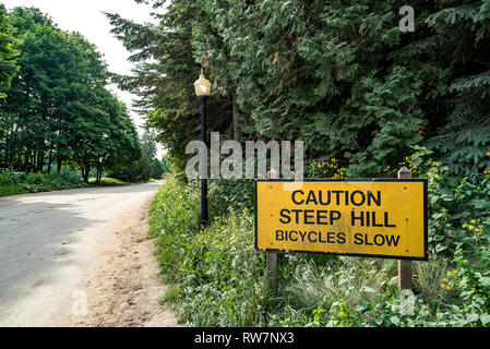 Caution steep hill road sign Stock Photo - Alamy