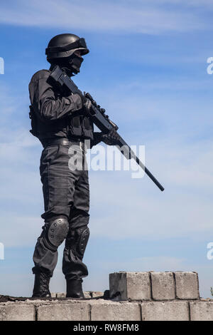 Side view of Police Special Operations Command red vehicle truck deploy ...