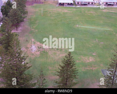 Elevated view of Broadbeach State School sports grounds, featuring a ...