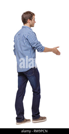 Side view of a walking businessman who stretches his hand for a ...