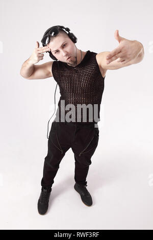 stylish young men of the rapper showing cool hand gesture Stock Photo ...