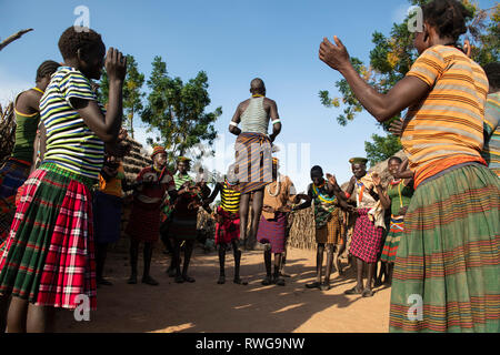 Traditional Karamojong dancing in a village, northern Uganda Stock ...