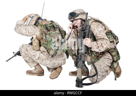 Soldier crouching under fire and screaming orders Stock Photo - Alamy
