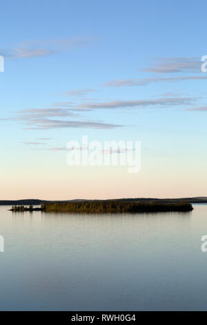 Sundown over Dillabough Lake in northern Manitoba, Canada. The sun ...