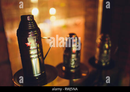 many hookah caps in a hookah cafe Stock Photo - Alamy