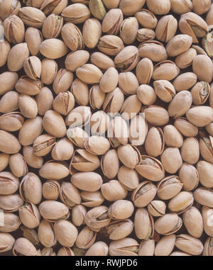 Healthy snack: raw nuts and dried fruit, decorated with mint. Vintage ...