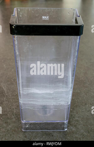 Limescale on plastic water tank from coffee machine Stock Photo - Alamy