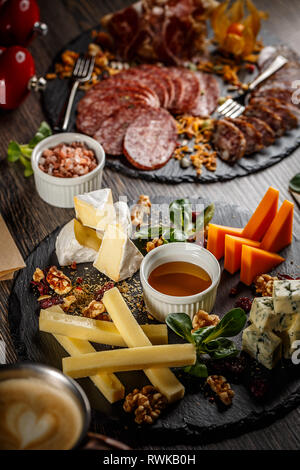 Cold cuts and cheese snack time, party appetizer food Stock Photo - Alamy
