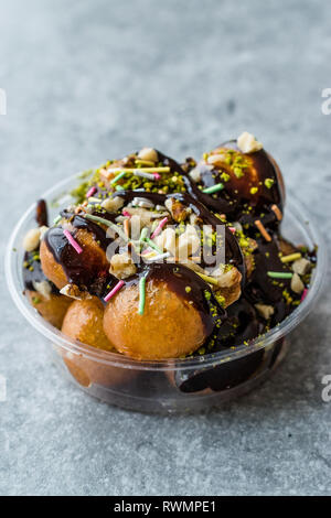 Turkish Dessert Lokma with Chocolate Sauce / Round Fried Dough Balls ...