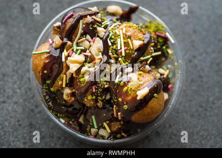 Turkish Dessert Lokma with Chocolate Sauce / Round Fried Dough Balls ...