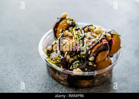 Turkish Dessert Lokma with Chocolate Sauce / Round Fried Dough Balls ...
