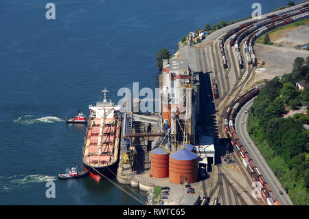 Loading Grain Cargo Ship Vancouver. A freighter is loaded with grain at ...