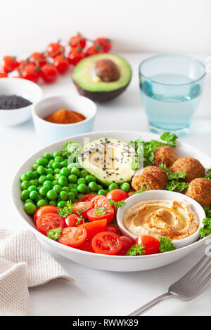 Fresh green peas with tomato sauce potatoes and carrot Greek food Stock ...