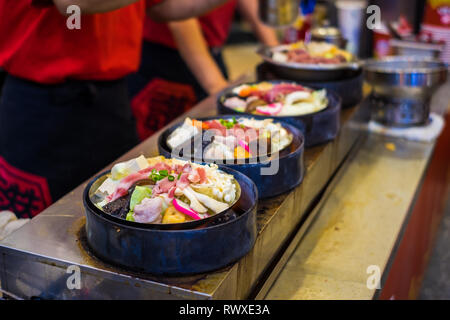 Hotpot in Taiwanese style. Hot pot is one of the most common street ...