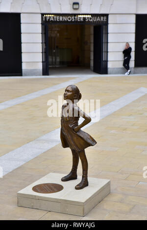 The bronze statue, "The Fearless Girl" by the artist Kristen Visbal ...