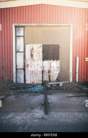 Rusty gate to warehouse. Large garage door. Details of industrial ...