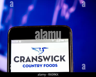 Cranswick plc company logo seen displayed on smart phone Stock Photo ...