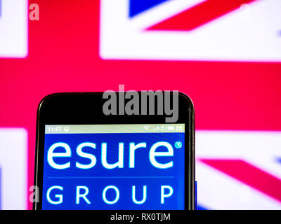 Esure Group plc company logo seen displayed on smart phone Stock Photo ...
