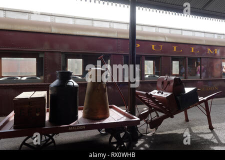 Old style luggage on porters’ trolley and cart on the platform, Maldon ...