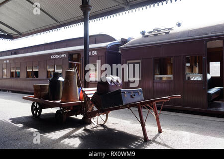 Old style luggage on porters’ trolley and cart on the platform, Maldon ...